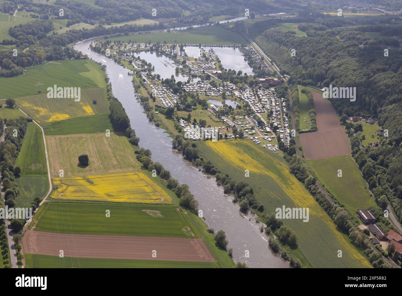 Aerial view, Camp Feuerland campsite on the River Weser, bathing lake and Weser cycle path in ...