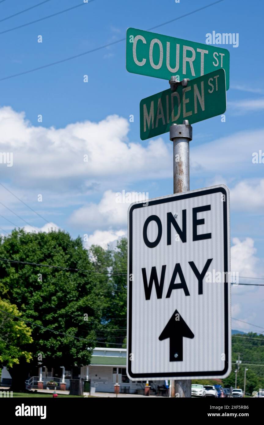 One Way sign at intersection Stock Photo - Alamy