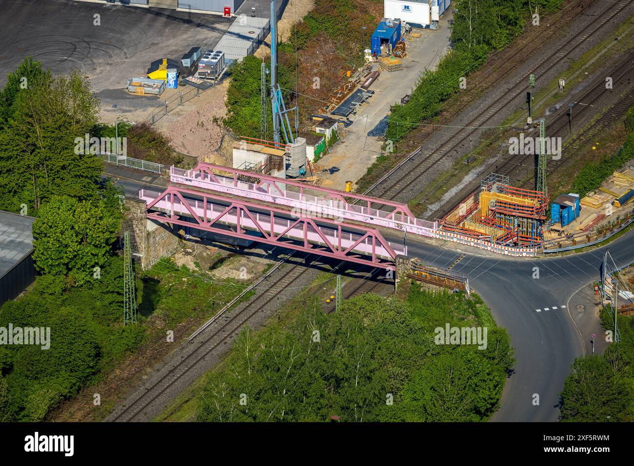 Pink bridge over railroad tracks construction site hi-res stock ...