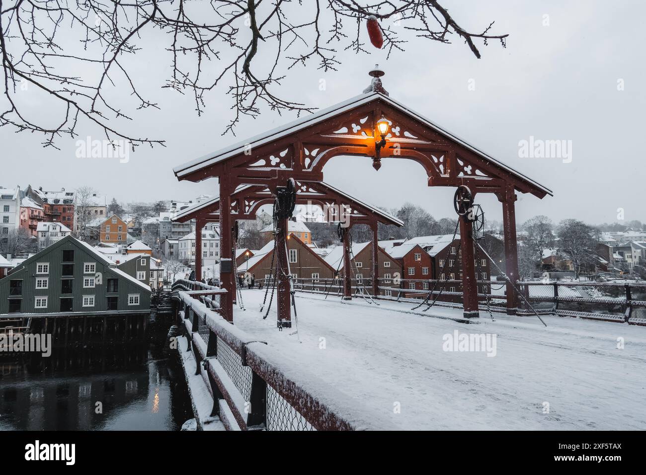 Snowfall in Norwegian city Trondheim, view of the snowy The Old Bridge ...