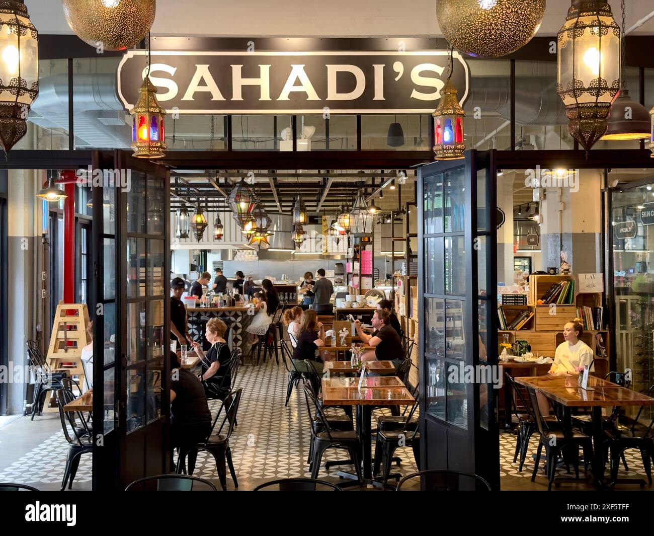 Books people middle eastern food eatery hi-res stock photography and ...