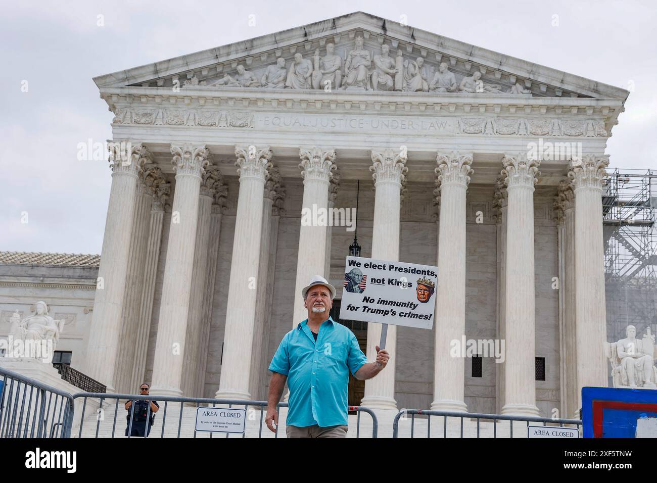 Washington DC, USA. 01st July, 2024. Gary Roush holds up a sign outside ...