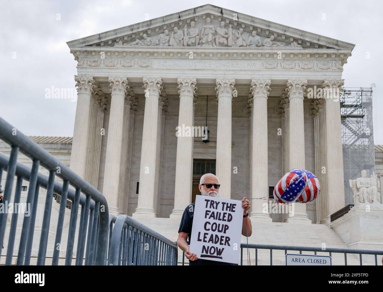 Washington DC, USA. 01st July, 2024. Bill Christeson holds up a sign ...