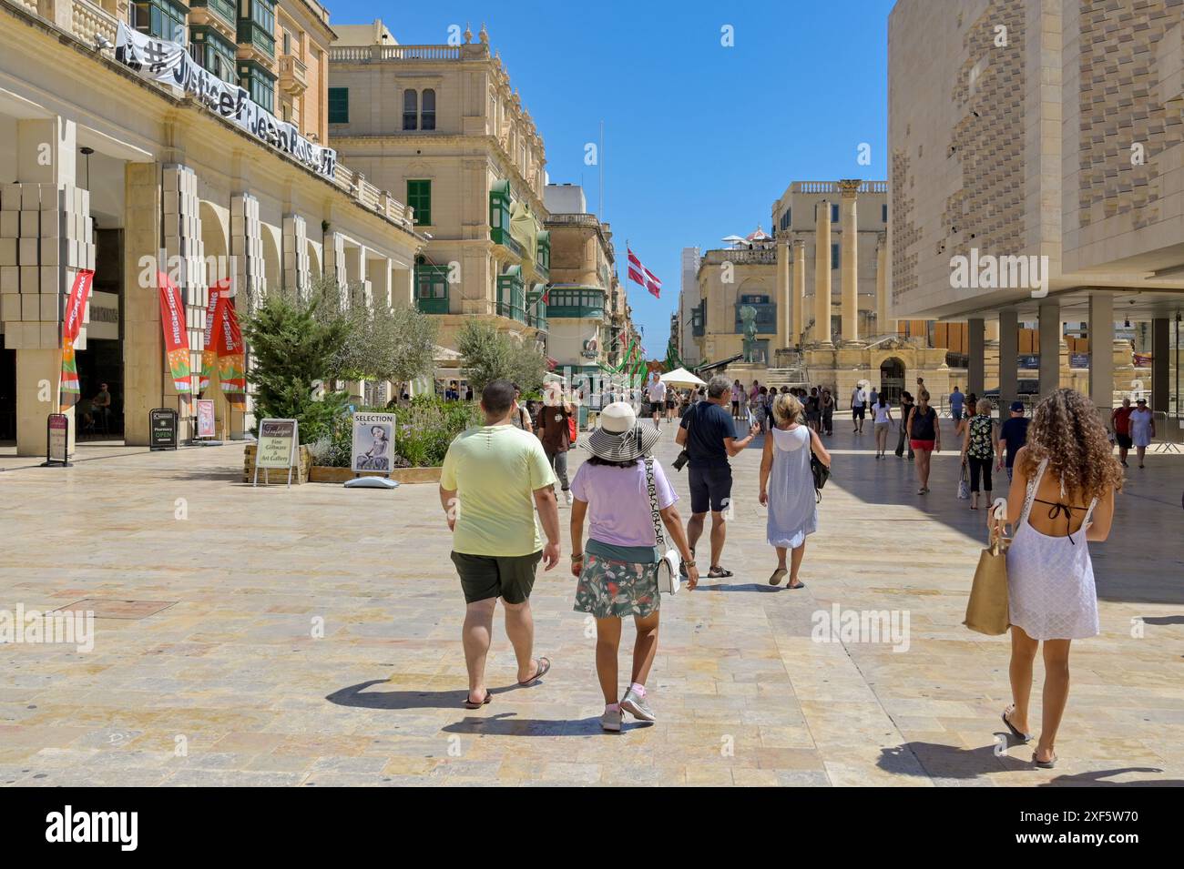 Valletta, Malta - 3 August 2023: People walking past the Maltese ...