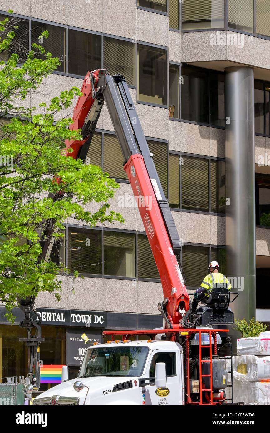 Washington DC, USA - 3 May 2024: Construction worker operating a ...