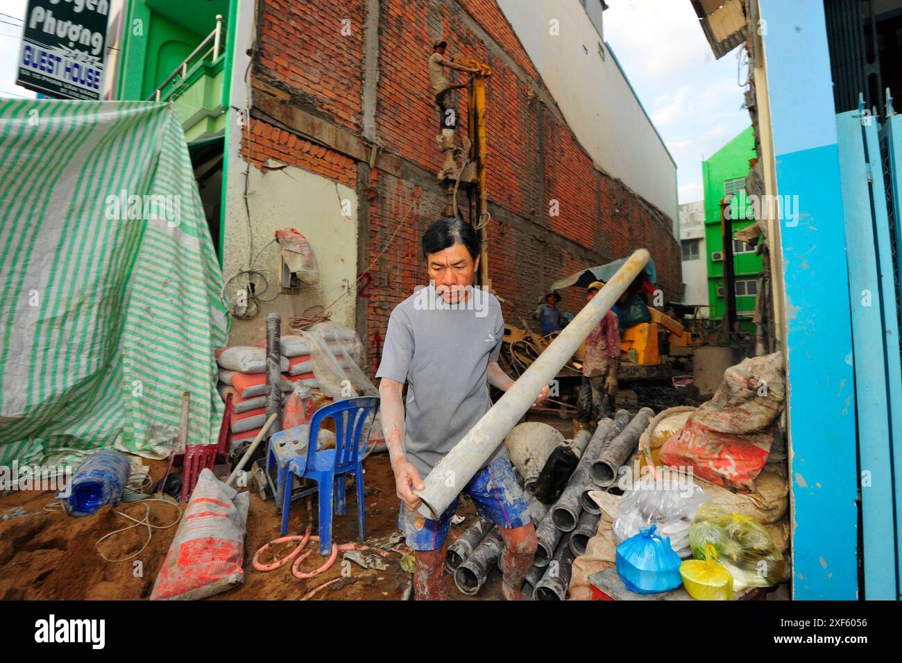 construction worker at a building site, employee in construction ...