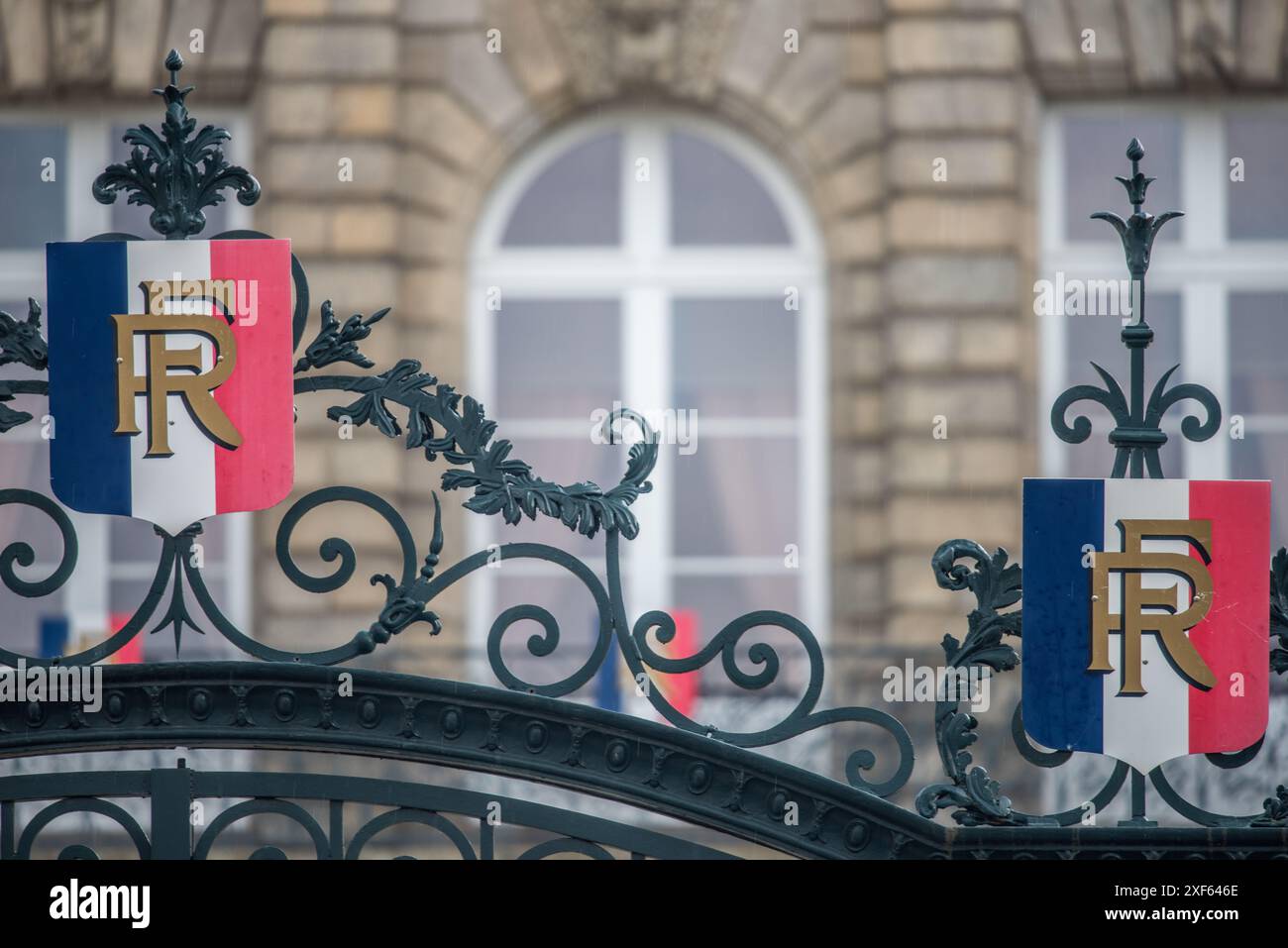 Close up of French shields on a decorative wrought iron fence in Vannes ...