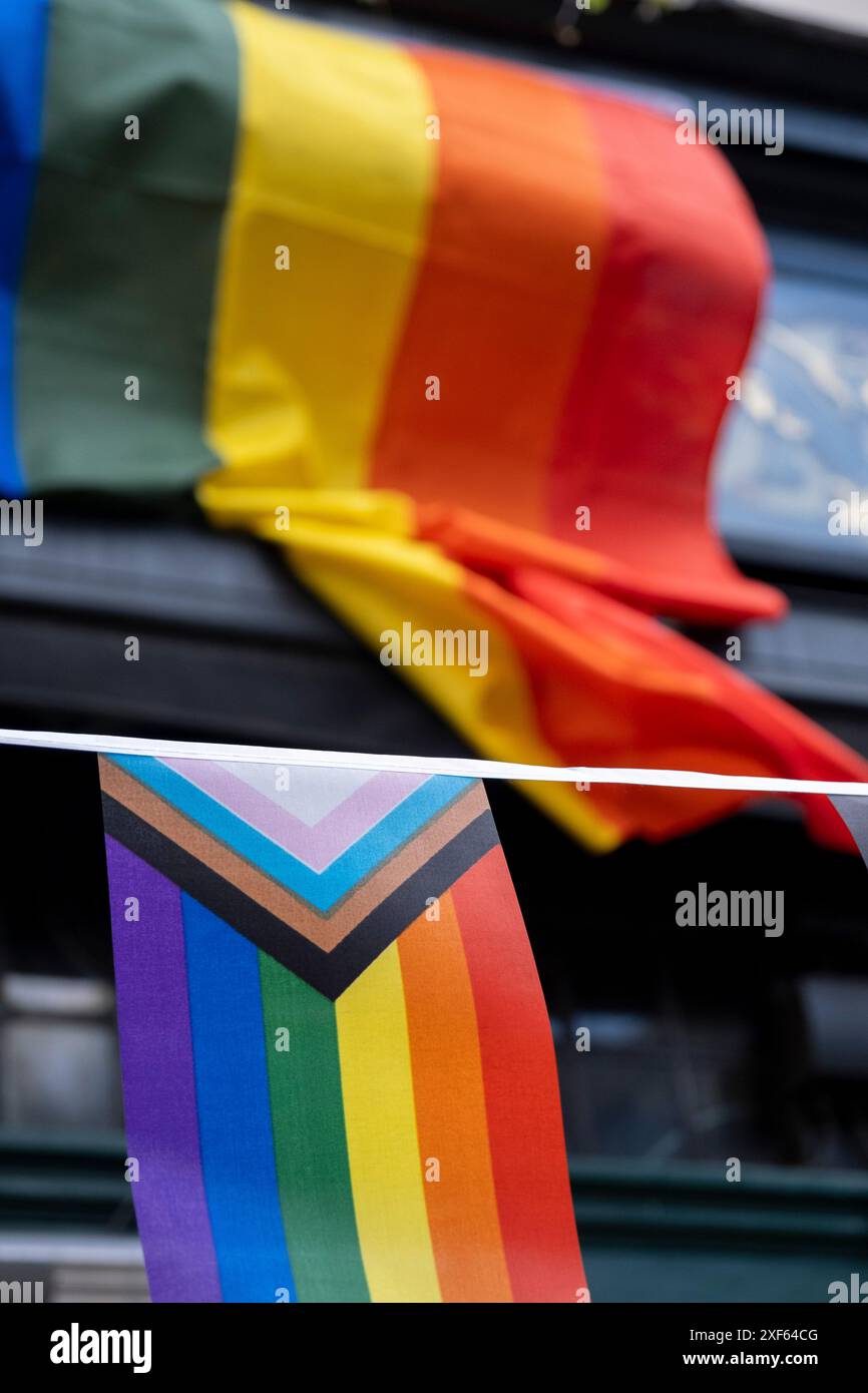 Pride Progress flag and rainbow flag in Soho on 30th June 2024 in ...