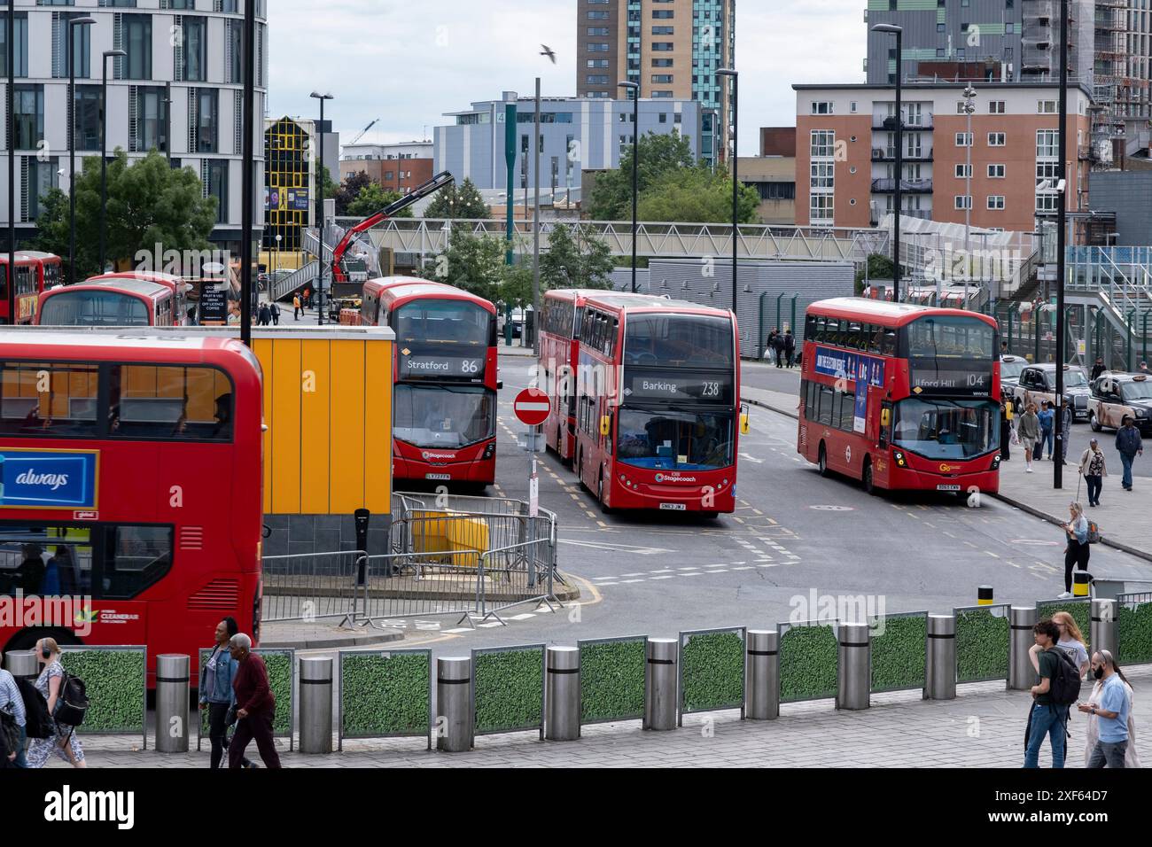 Red London buses at the major Transport for London public transport hub ...