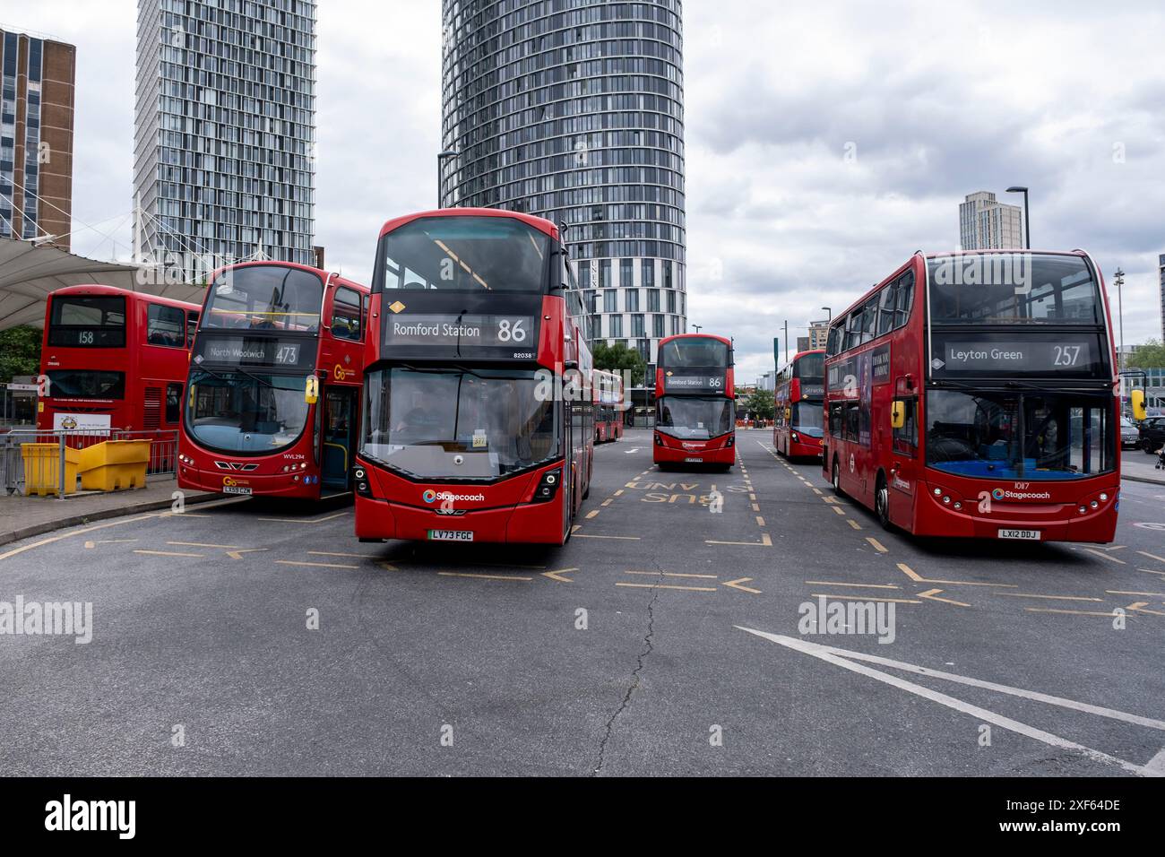 Red London buses at the major Transport for London public transport hub ...