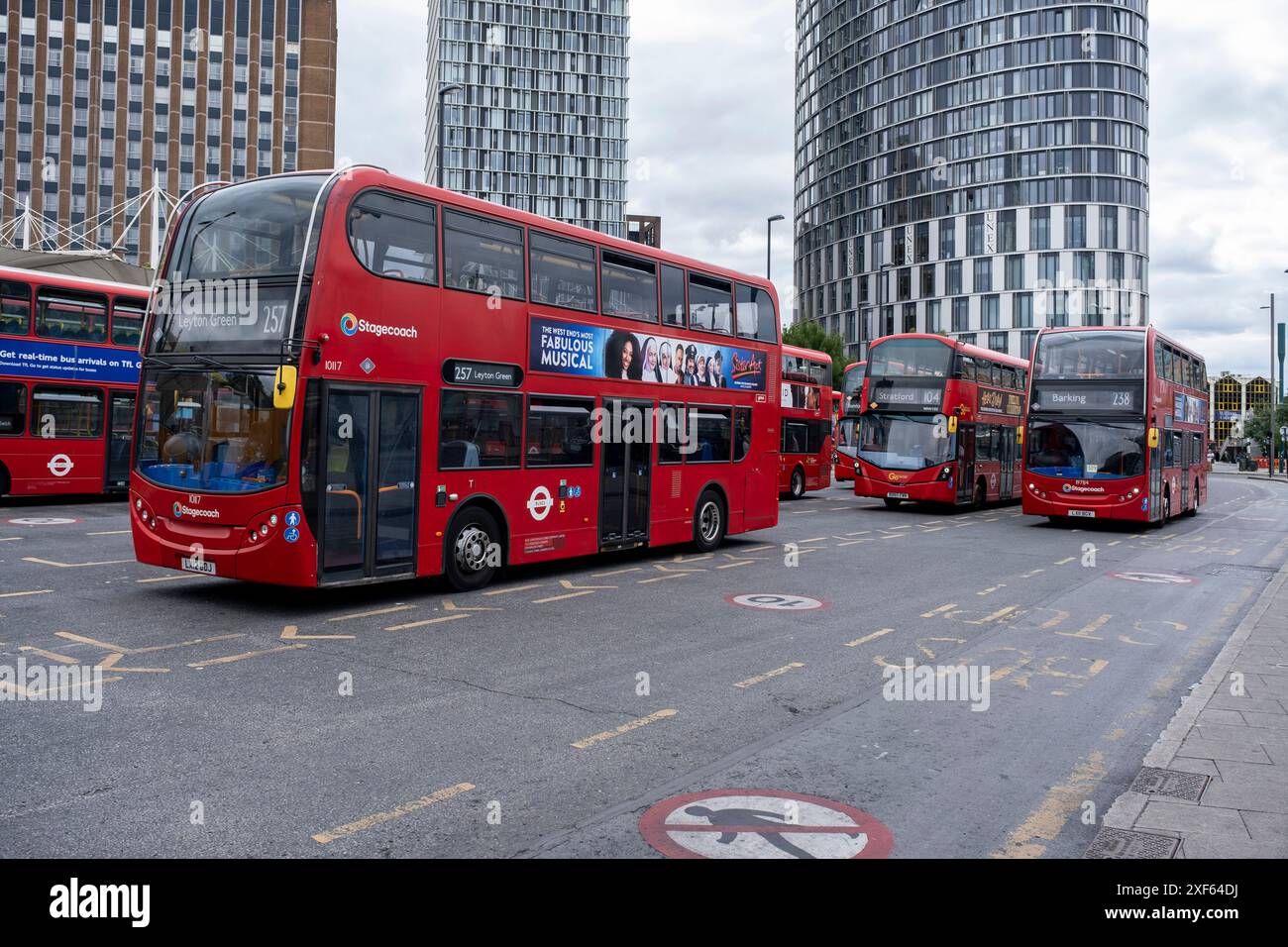 Red London buses at the major Transport for London public transport hub ...