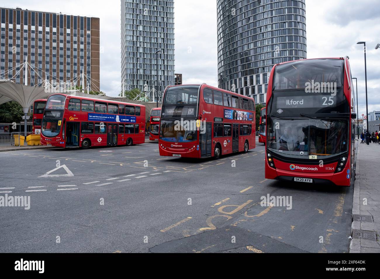 Red London buses at the major Transport for London public transport hub ...