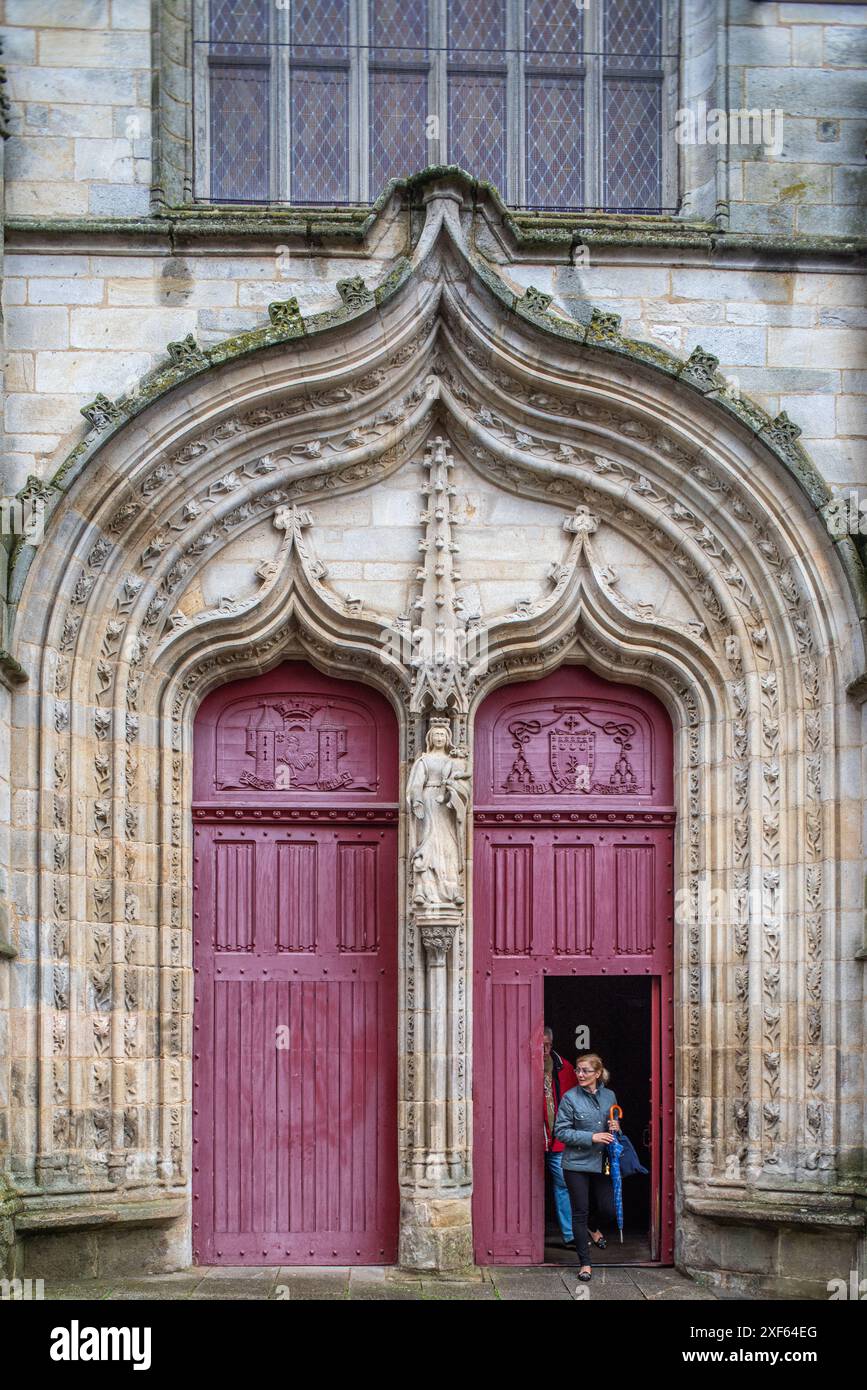 A close up of the intricate Gothic doorway of the Notre Dame du Roncier ...