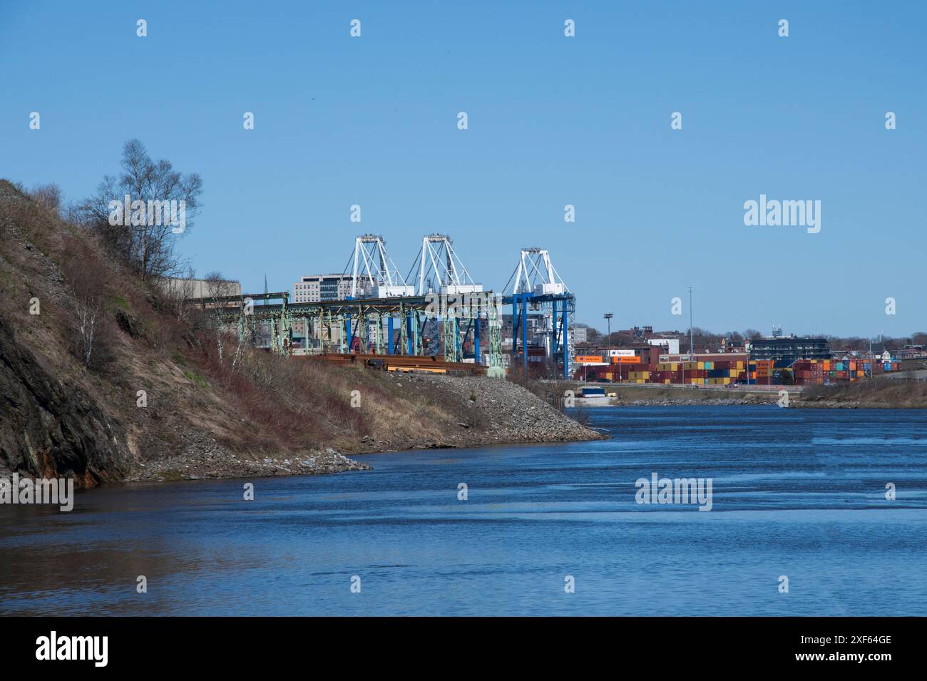 View of the container cranes at the port on the Saint John River from ...