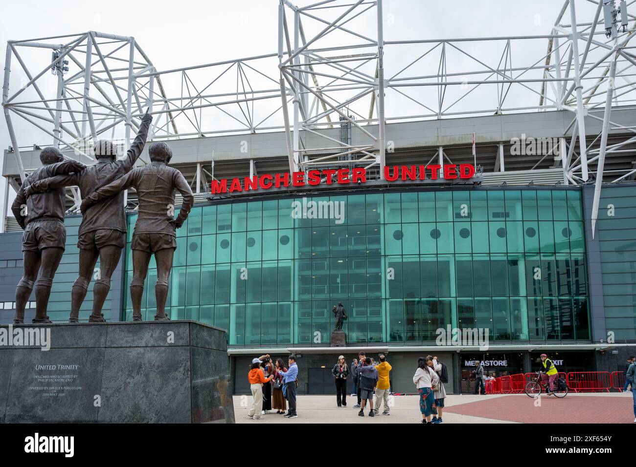 Manchester Trafford UK 29 June 2024. Tourists gather around the United ...
