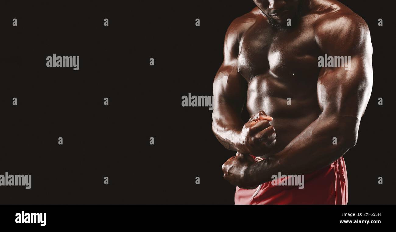 Muscular Man Flexing Biceps Stock Photo - Alamy