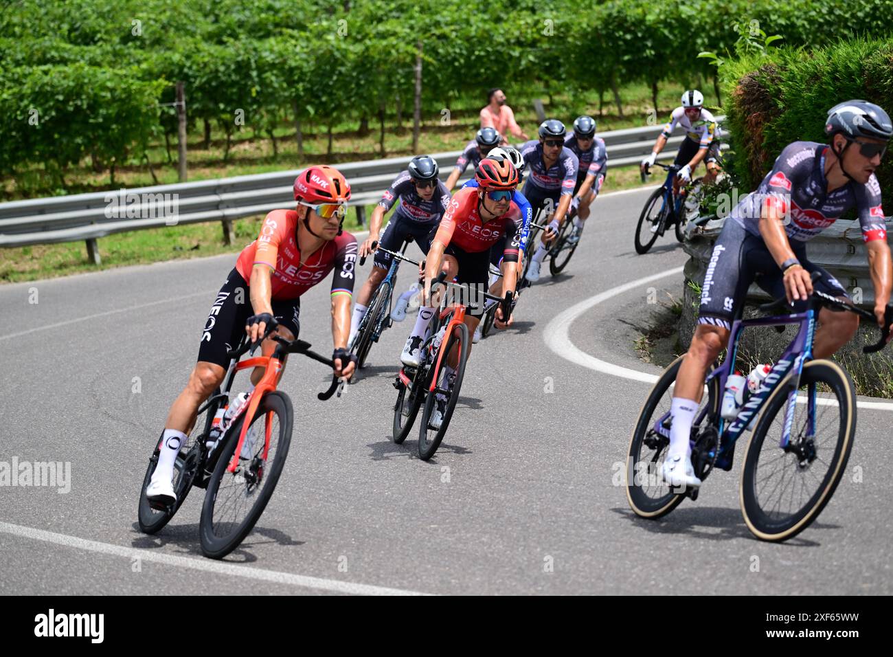 Tour de France 2024 Stage 3 Piacenza to Turin. Great Britain's Tom Pidcock descends with team ...
