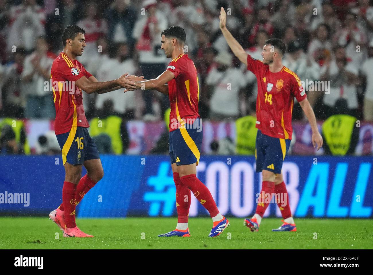 Koln, Germany. 30th June, 2024. Rodri Hernandez and Mikel Merino of ...