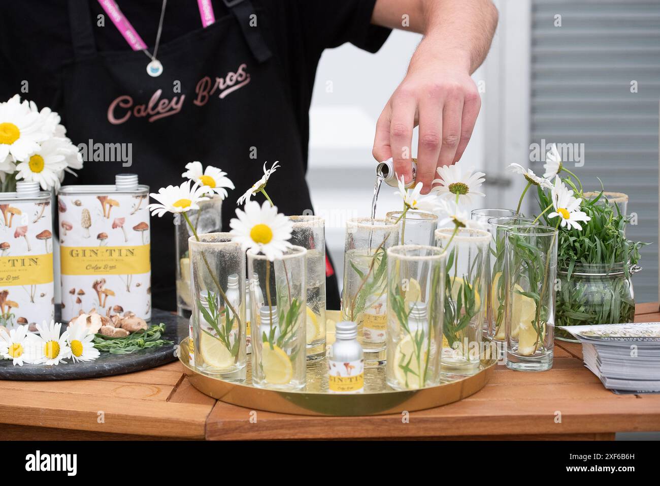 East Molesey, UK. 1st July, 2024. A bar tender mixes up a mushroom G&T ...