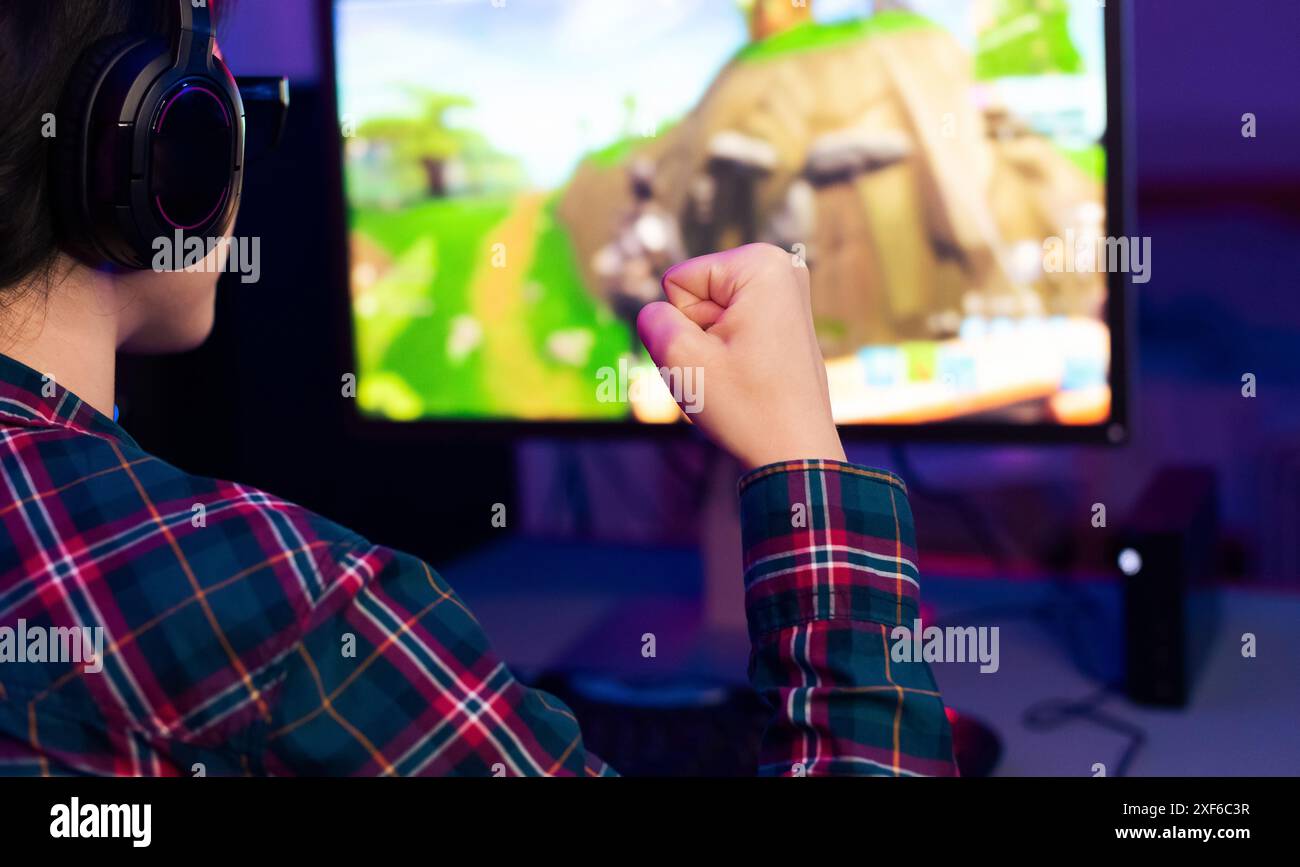 Gamer Celebrating Victory While Playing Video Game On Computer Stock ...