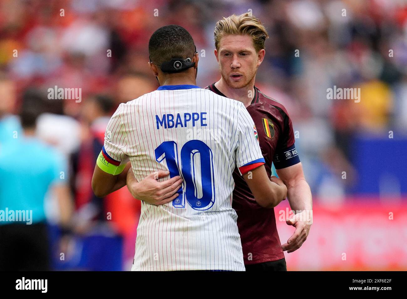 Belgium's Kevin De Bruyne (right) and France's Kylian Mbappe shake ...