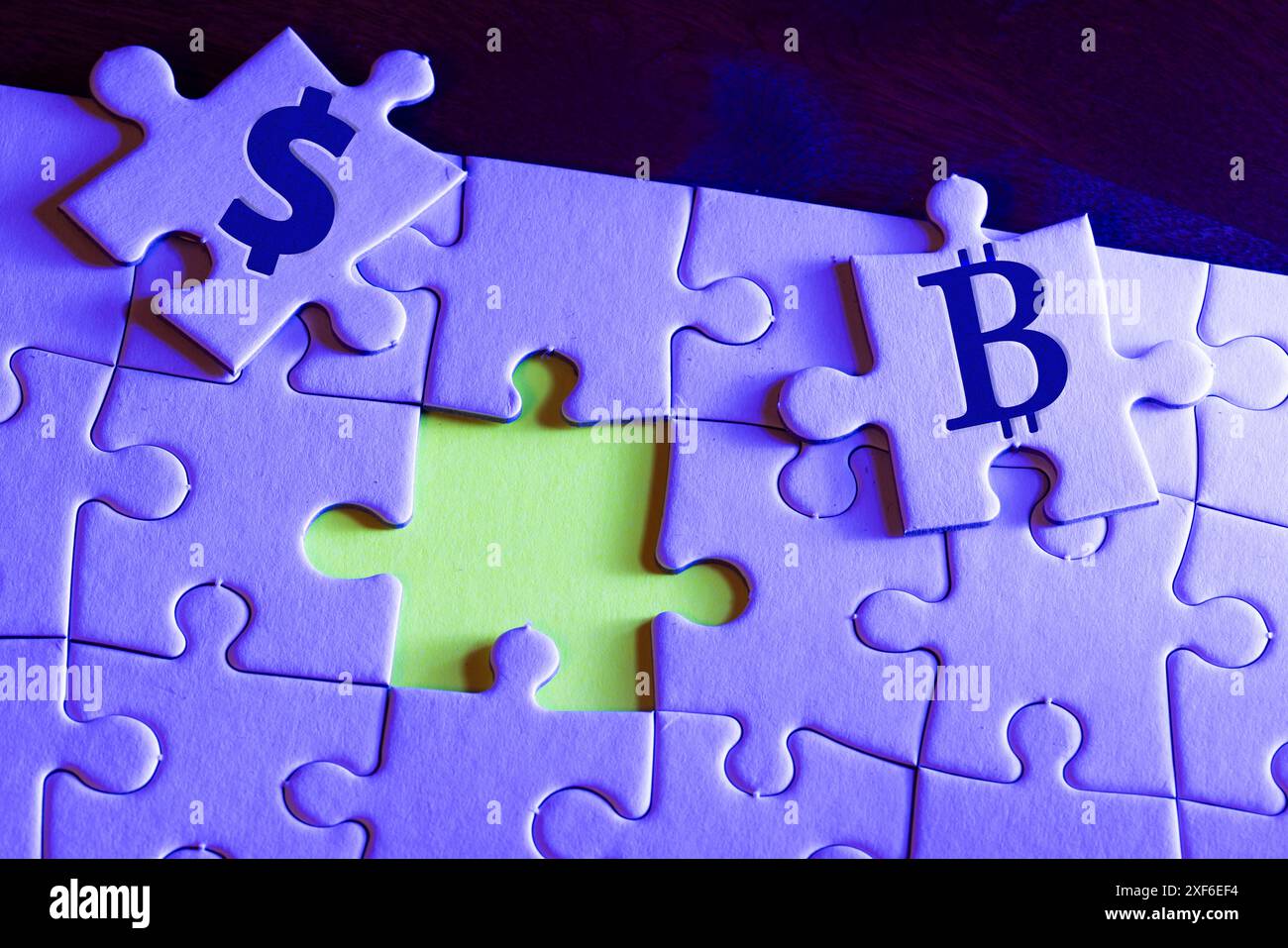 .A puzzle with a dollar sign and a bitcoin logo on it as a finacial ...
