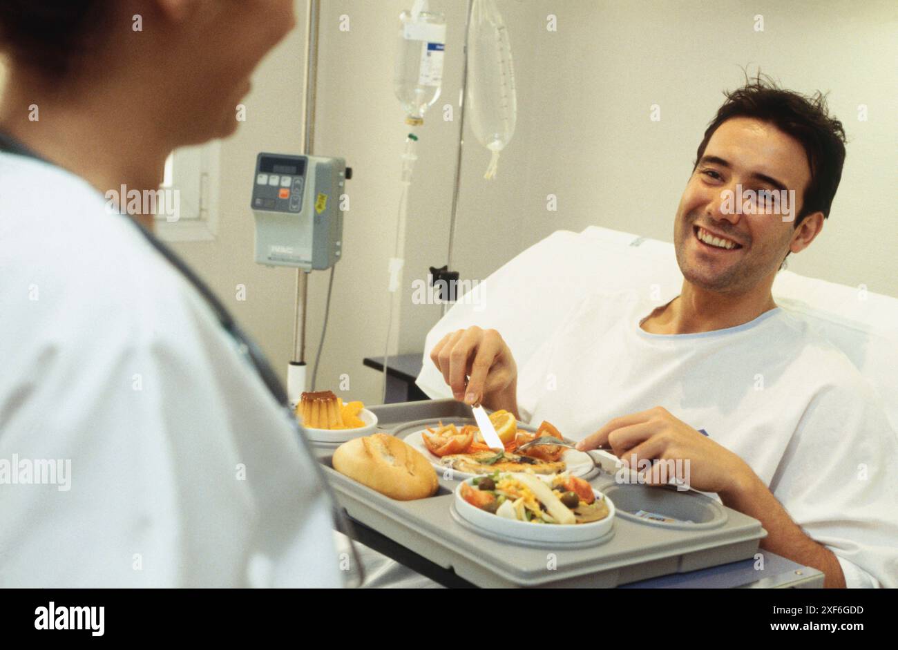 Male patient eating food in the hospital hi-res stock photography and ...