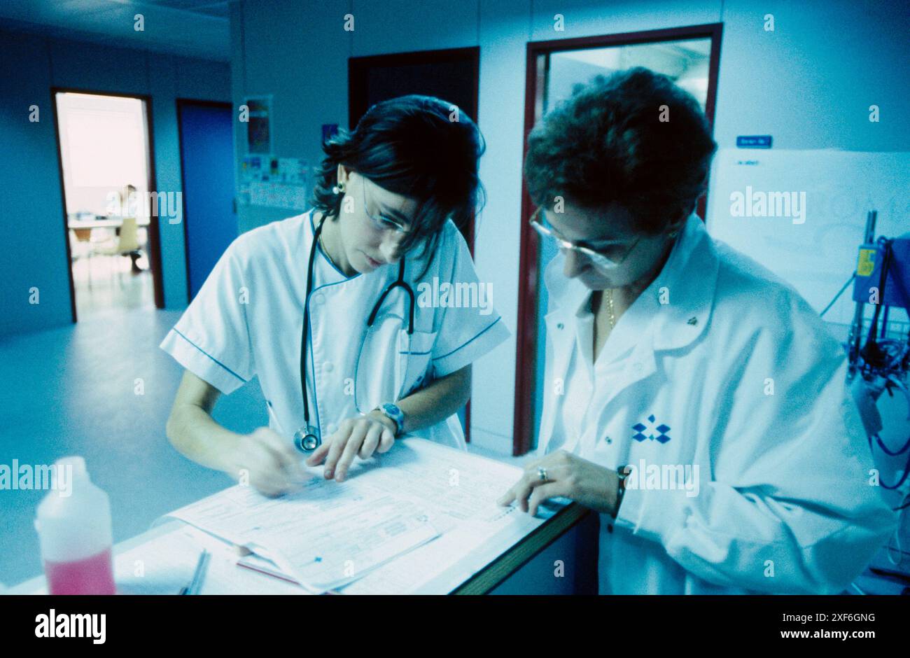 Nurses at admission desk in emergency area Stock Photo - Alamy