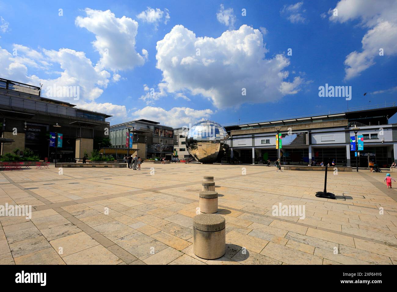 The Millennium Sphere reflecting blue sky and fluffy clouds in ...