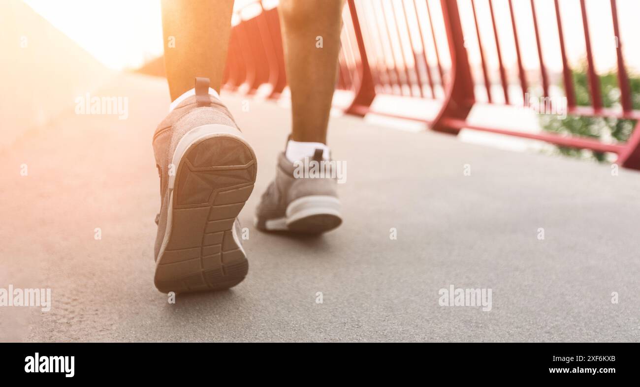 Walking feet on a street hi-res stock photography and images - Alamy