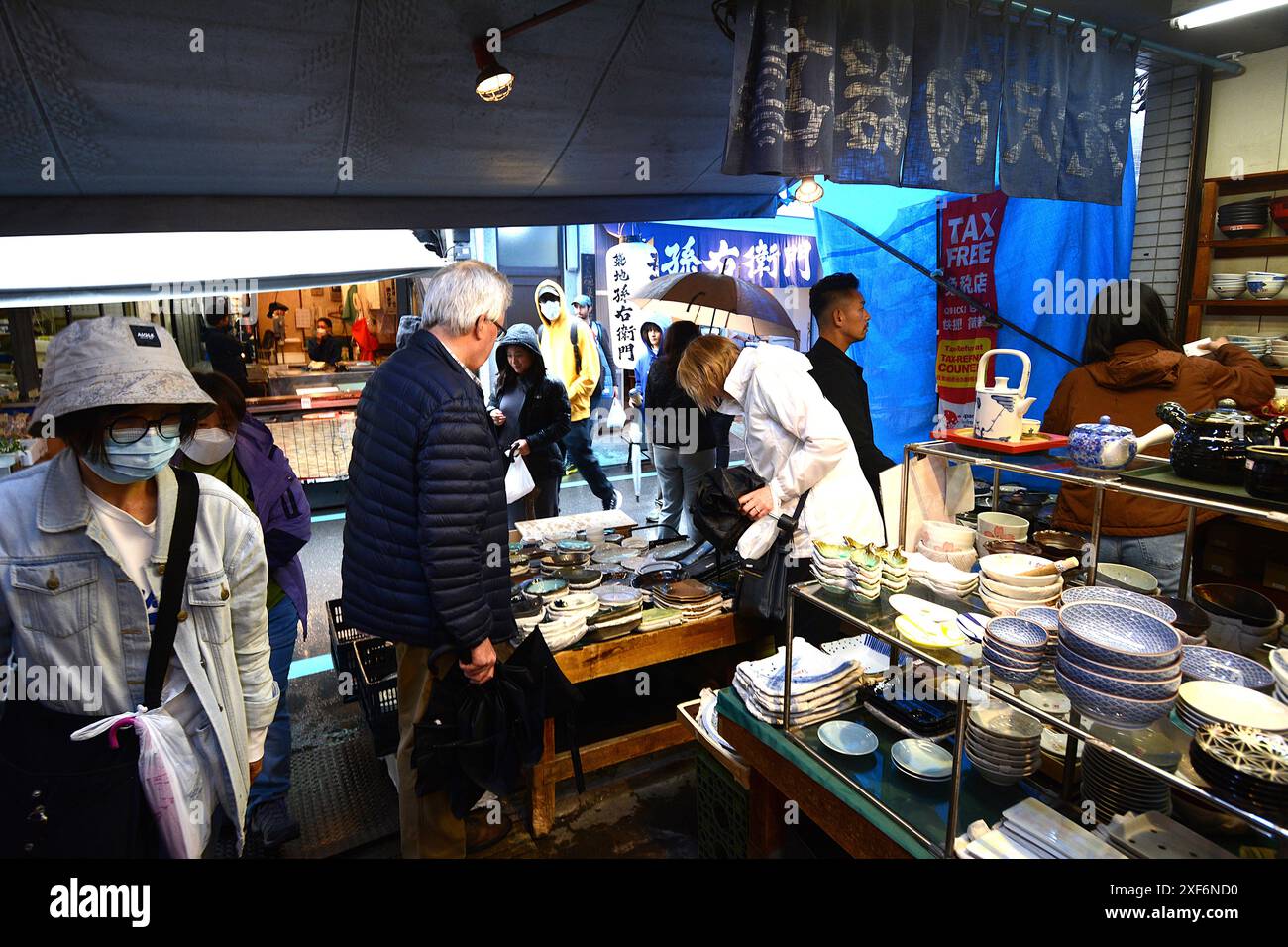 Tokyo Japan raining bad weather outside shop shops people rain cold ...
