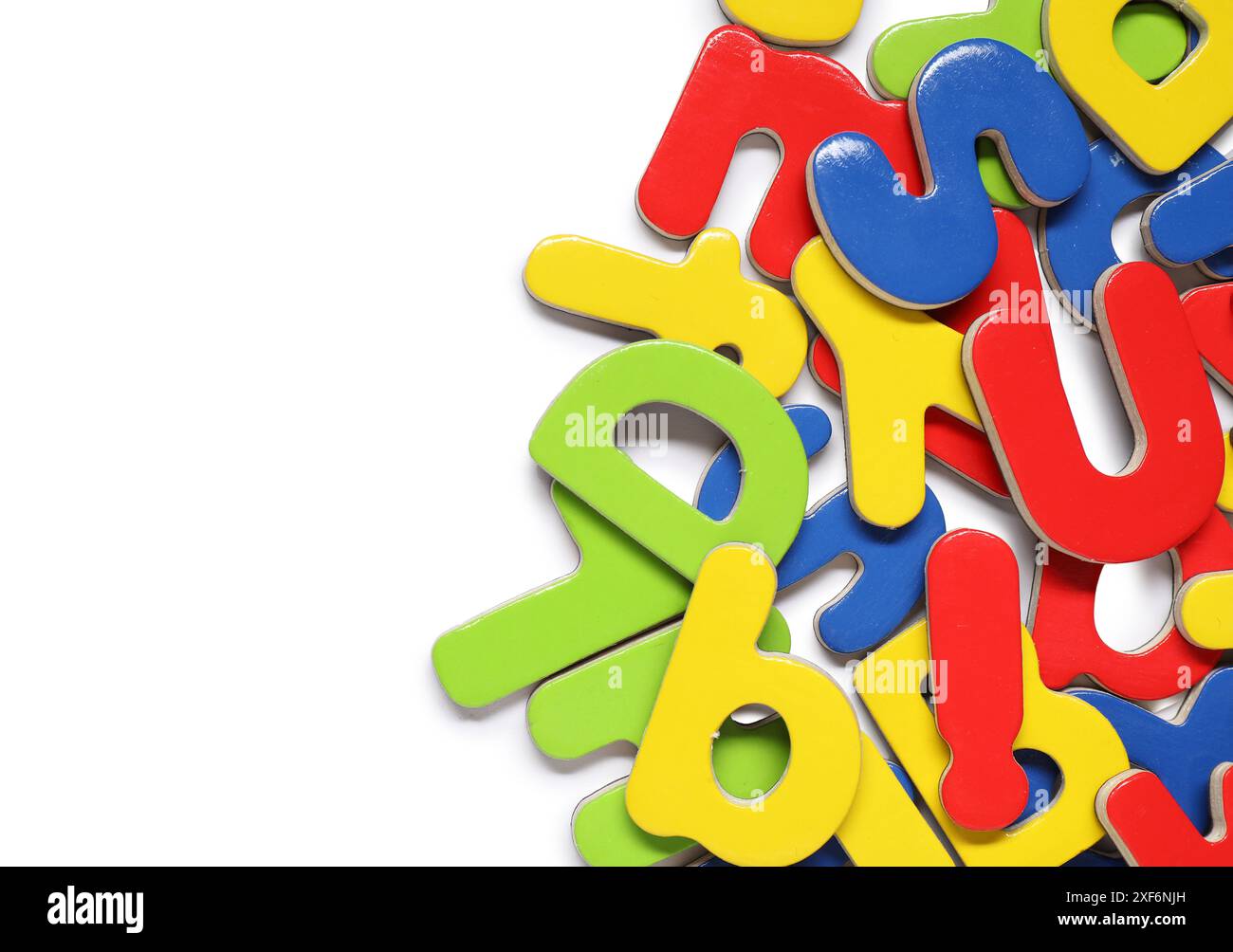Alphabet. Many colorful magnetic letters isolated on white, top view ...