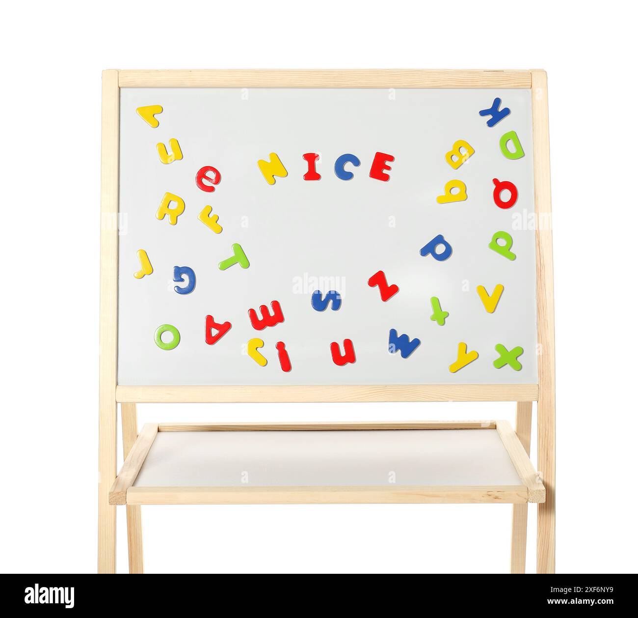 Word Nice made of magnetic letters on board against white background ...