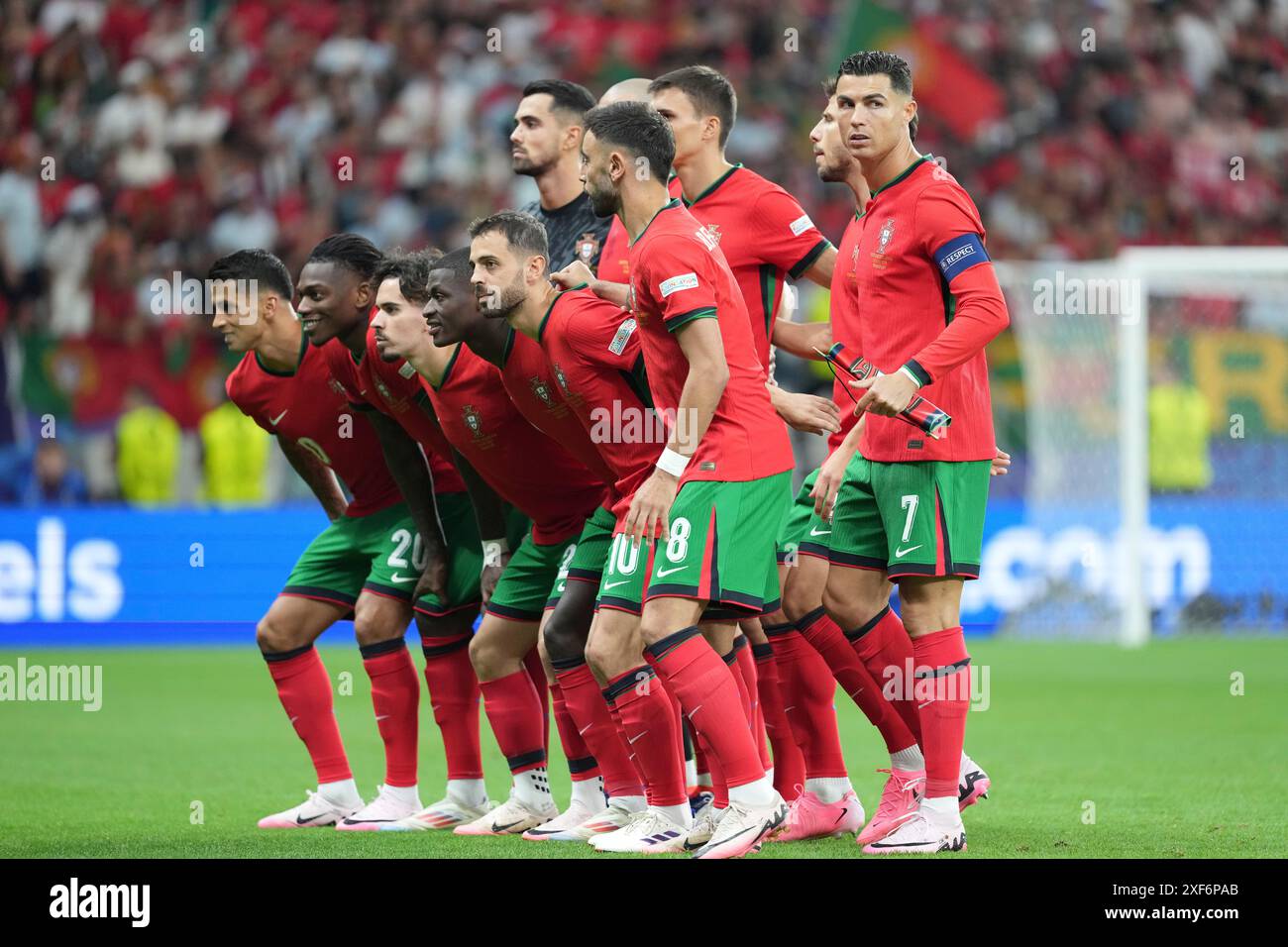 Portugal starting players pose for a team photo at the beginning of a ...