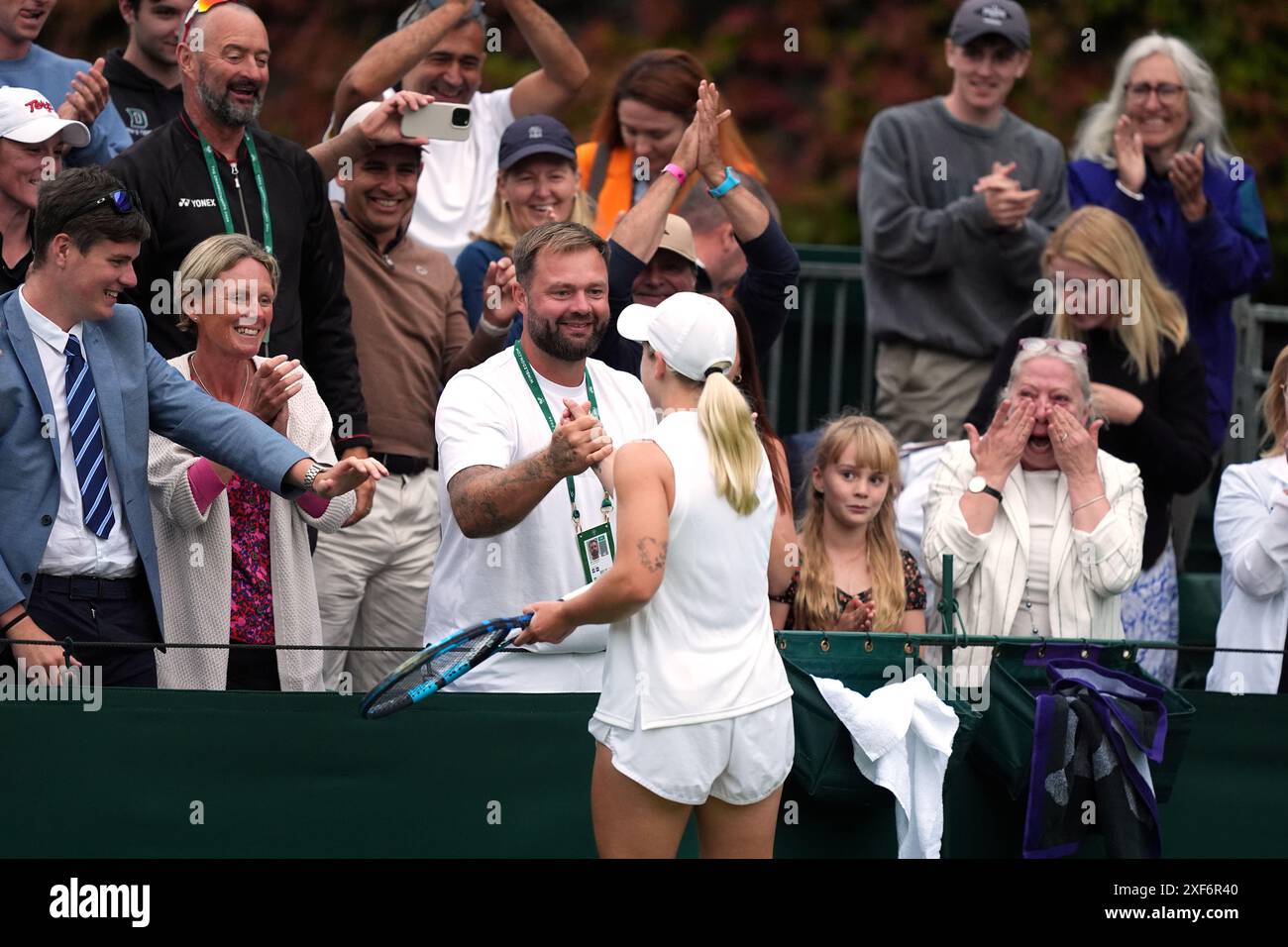 Sonay Kartal celebrates with her coach Ben Reeves following her victory ...