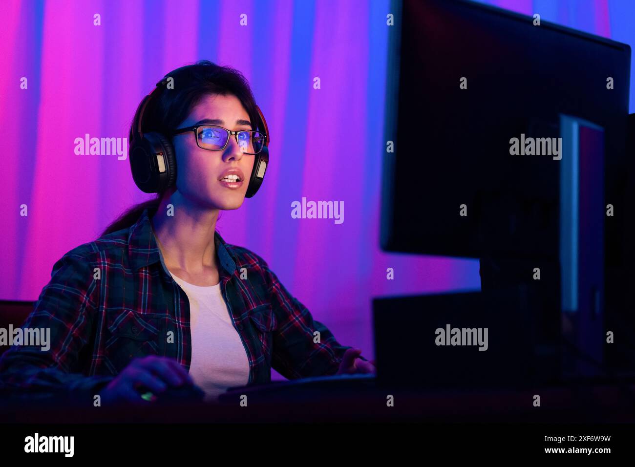 Young gamer plays on computer hi-res stock photography and images - Alamy