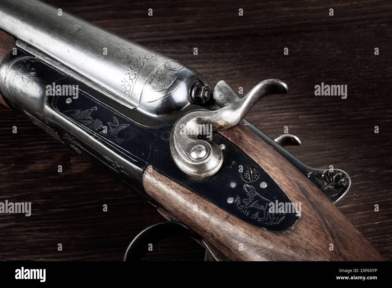 double barreled side shotgun on wooden table Stock Photo - Alamy