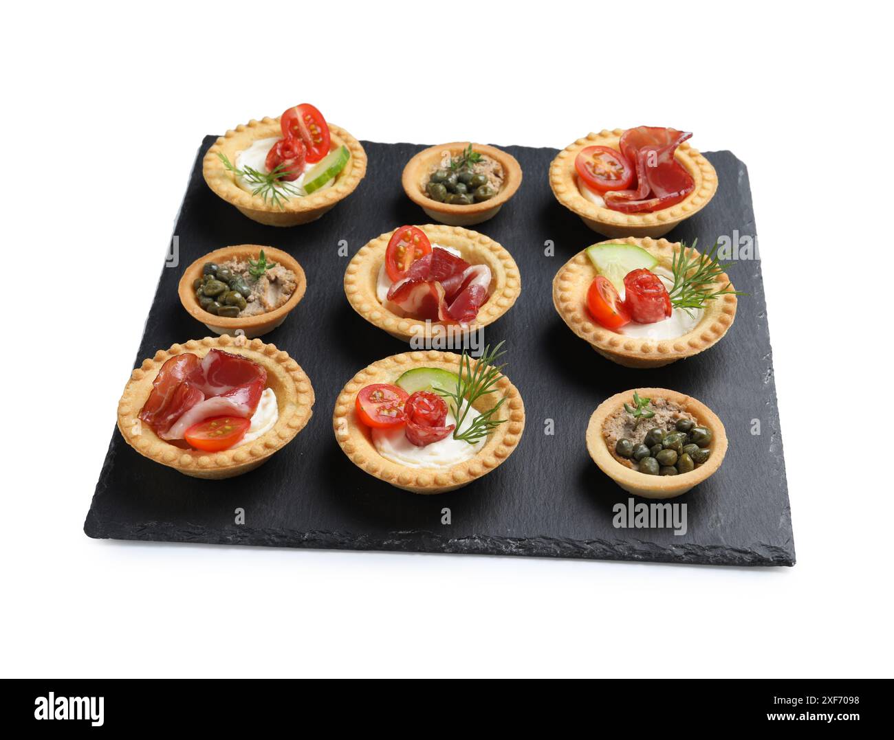 Delicious canapes with dry smoked sausages, jamon and pate isolated on ...