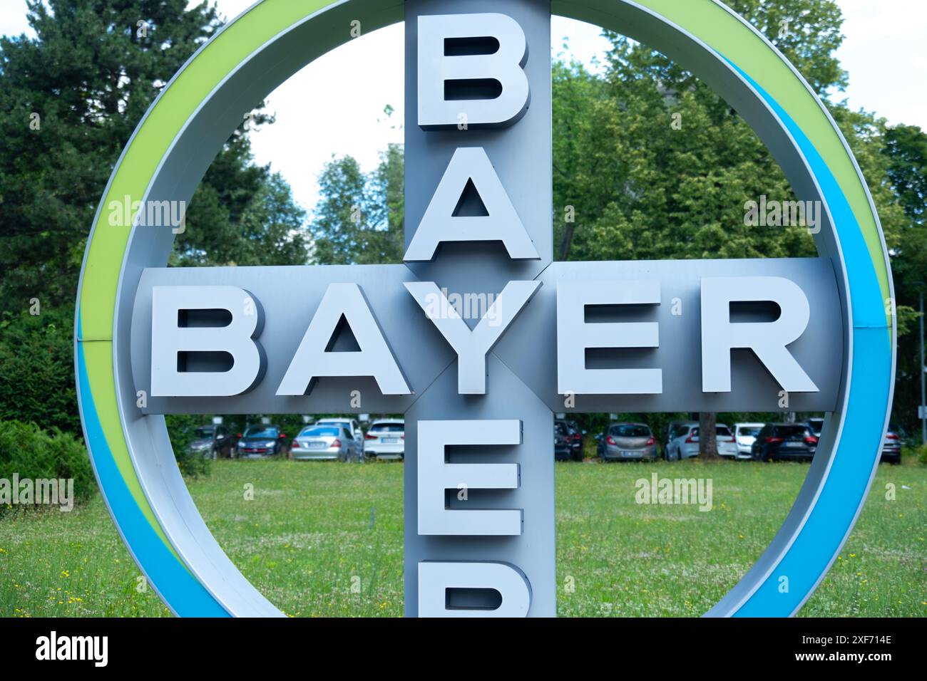 Bayer logo and Consumer Health Division sign, pharmaceutical industry ...