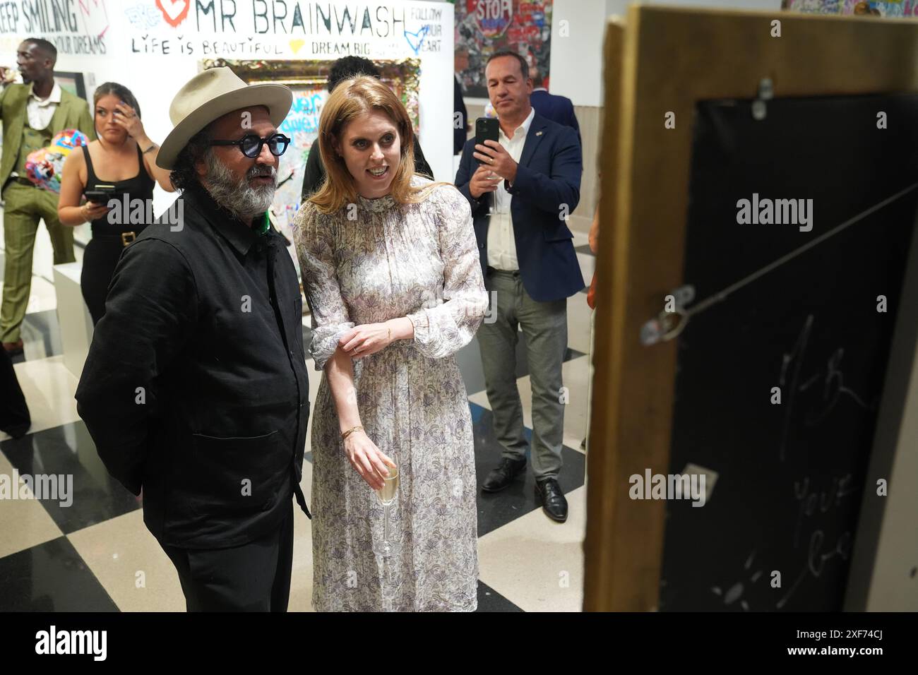 Mr Brainwash (left) and Princess Beatrice attend the unveiling of ...
