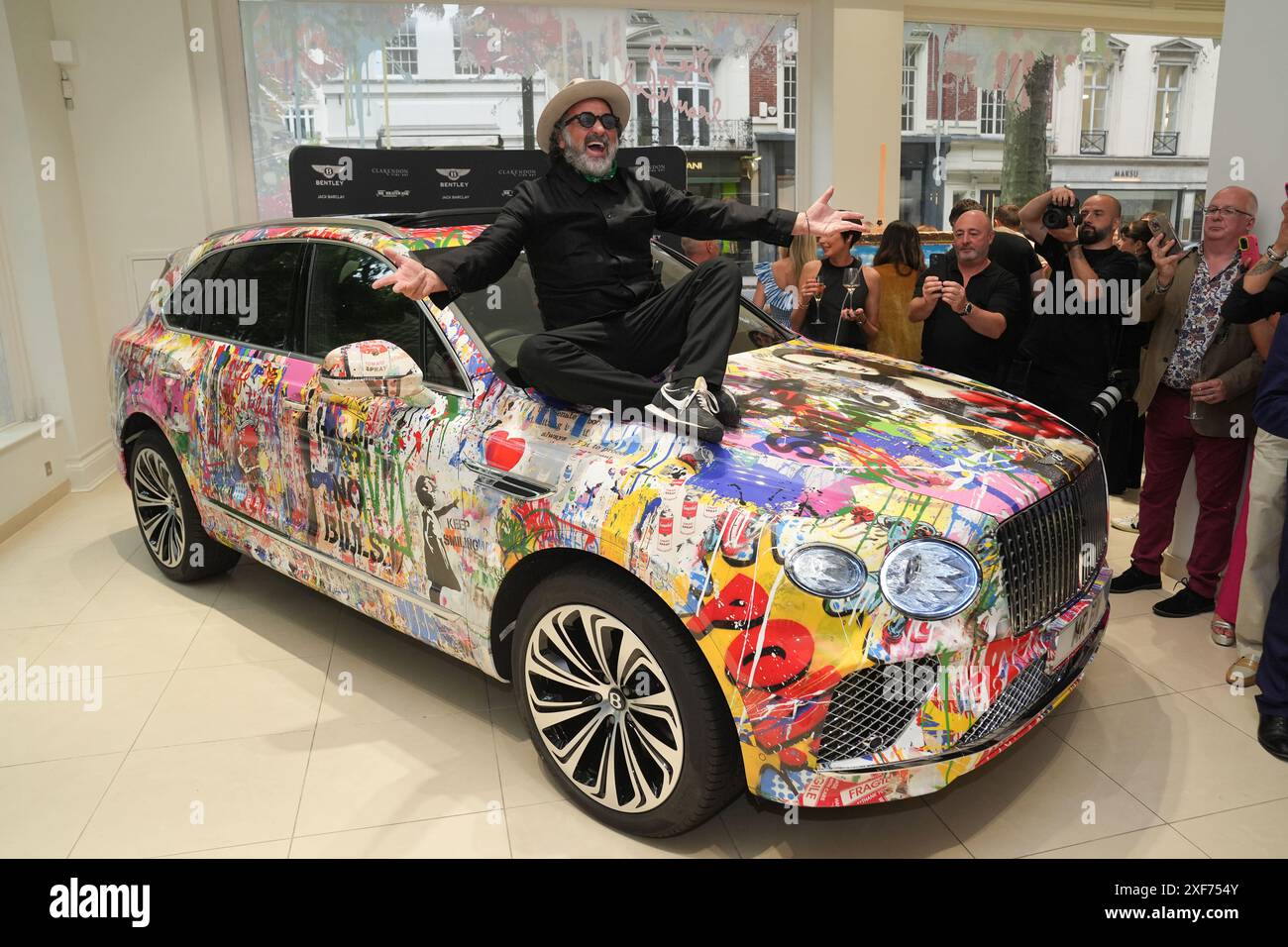 Street artist Mr Brainwash attends the unveiling of his work at Jack ...