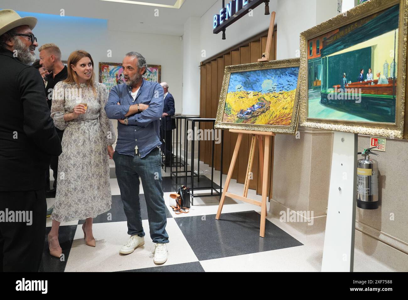 Mr Brainwash (far left) and Princess Beatrice (second left) attend the ...