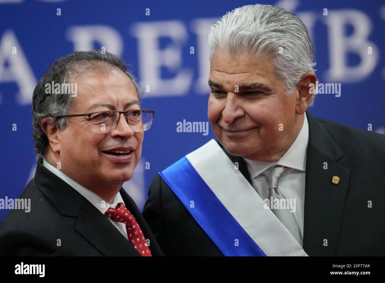 New Panamanian President Jose Raul Mulino smiles as Colombian President ...