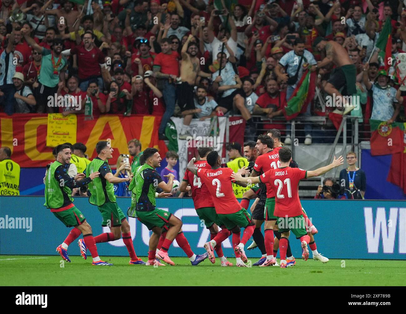 Portugal players celebrate winning the penalty shootout during the UEFA ...