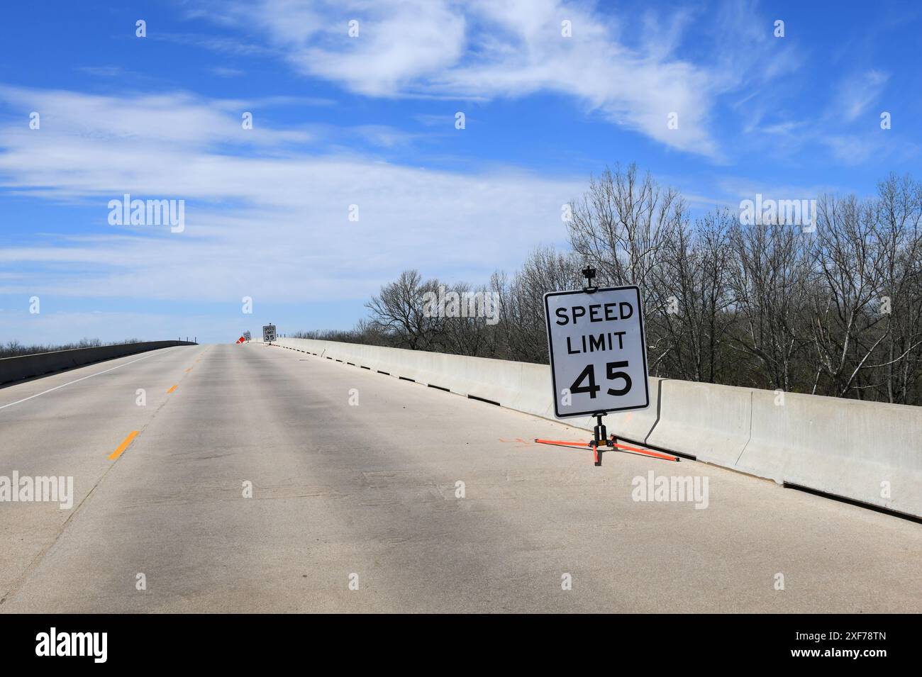 Bridge, in Arkansas, disappears over the arch in the structure. But ...