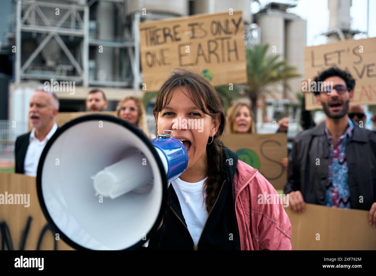Close up nonconformist gen z activist woman shouting at protest ...