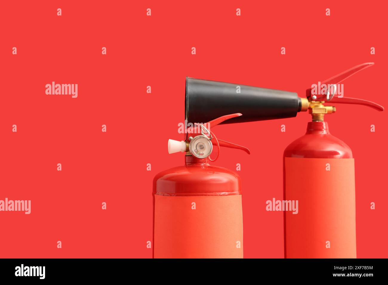 Fire extinguishers on red hi-res stock photography and images - Alamy