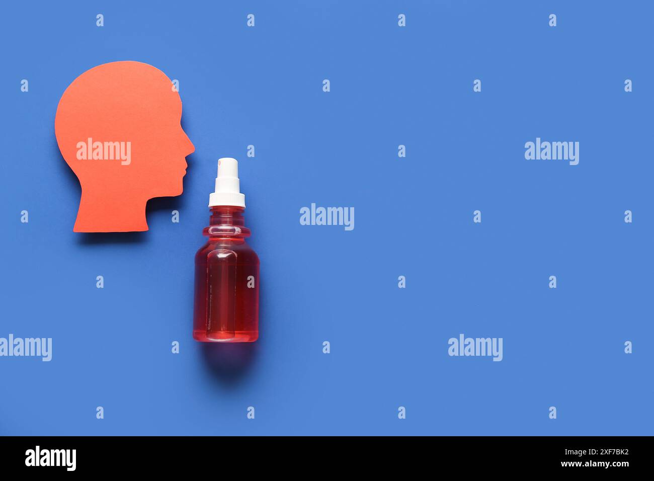 Paper human head with cough spray on blue background Stock Photo - Alamy