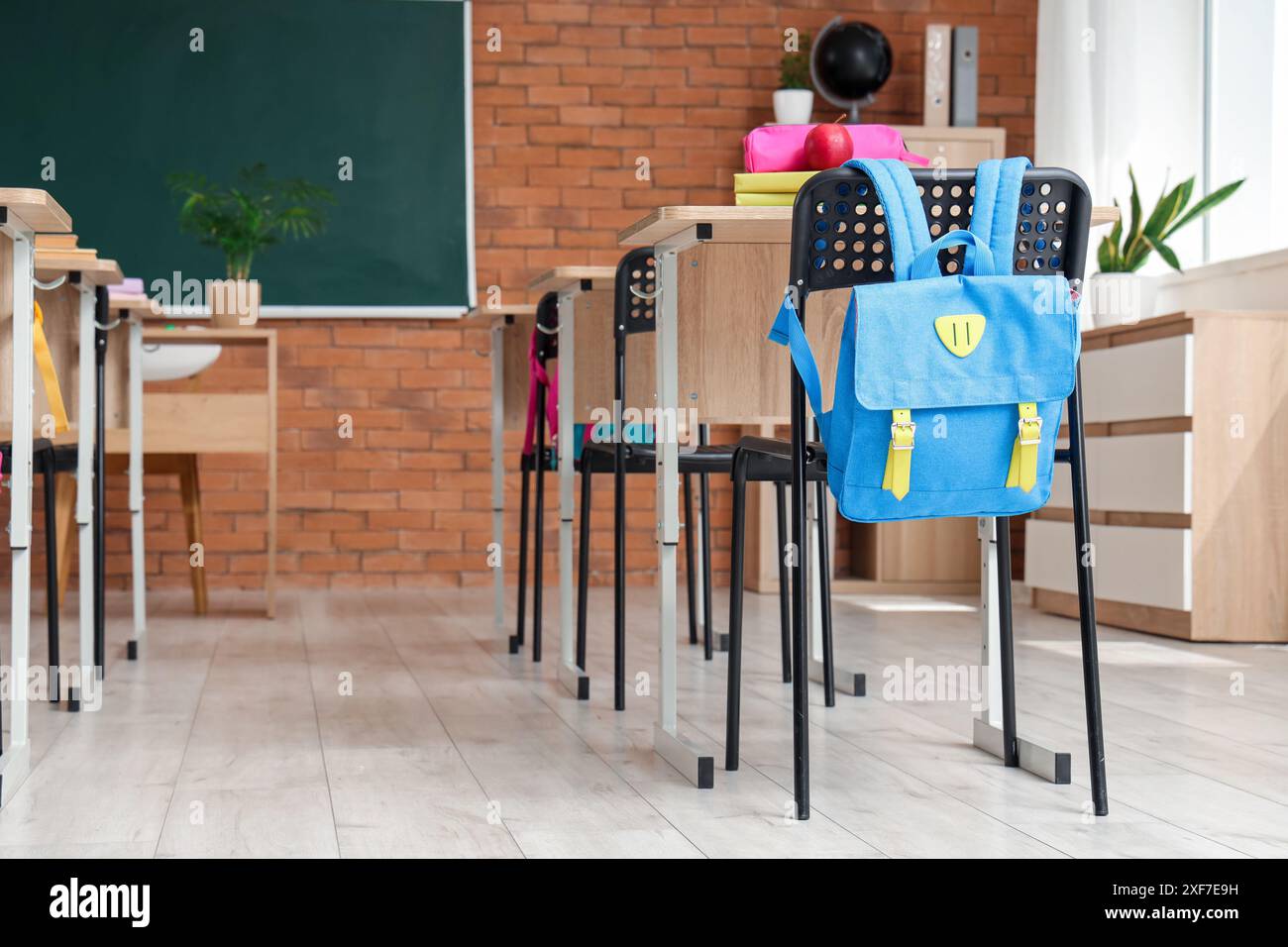 Backpack classroom chair hi-res stock photography and images - Alamy