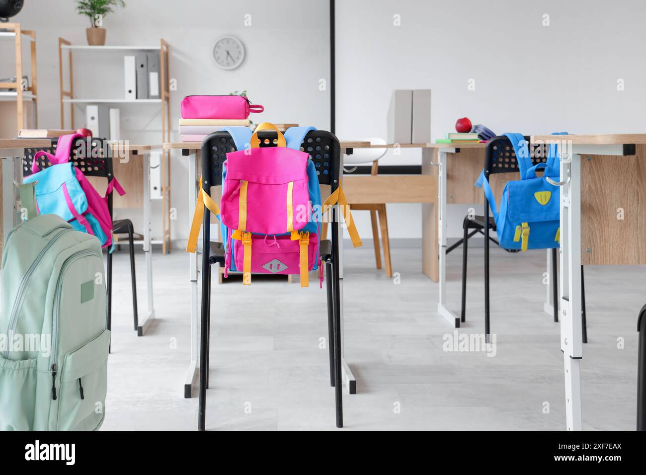 Children backpacks classroom table hi-res stock photography and images ...